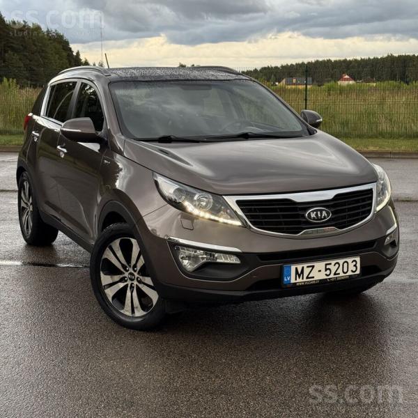 Коричневый Киа Sportage 2011 в Рига, объемом двигателя 2.00 л и пробегом 184 тыс. км за 7500 €, фото 3 на AUTOMOTO.COM.LV