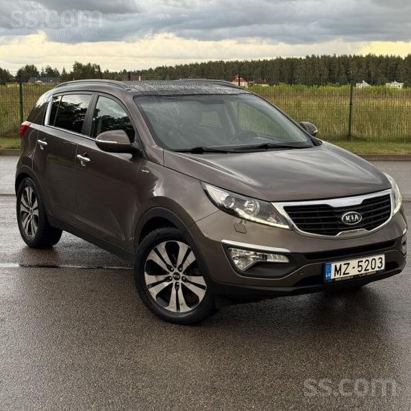 Коричневый Киа Sportage 2011 в Рига, объемом двигателя 2.00 л и пробегом 184 тыс. км за 7500 €, фото 4 на AUTOMOTO.COM.LV