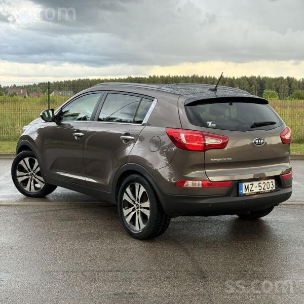 Коричневый Киа Sportage 2011 в Рига, объемом двигателя 2.00 л и пробегом 184 тыс. км за 7500 €, фото 6 на AUTOMOTO.COM.LV