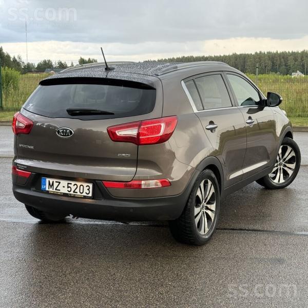 Коричневый Киа Sportage 2011 в Рига, объемом двигателя 2.00 л и пробегом 184 тыс. км за 7500 €, фото 7 на AUTOMOTO.COM.LV