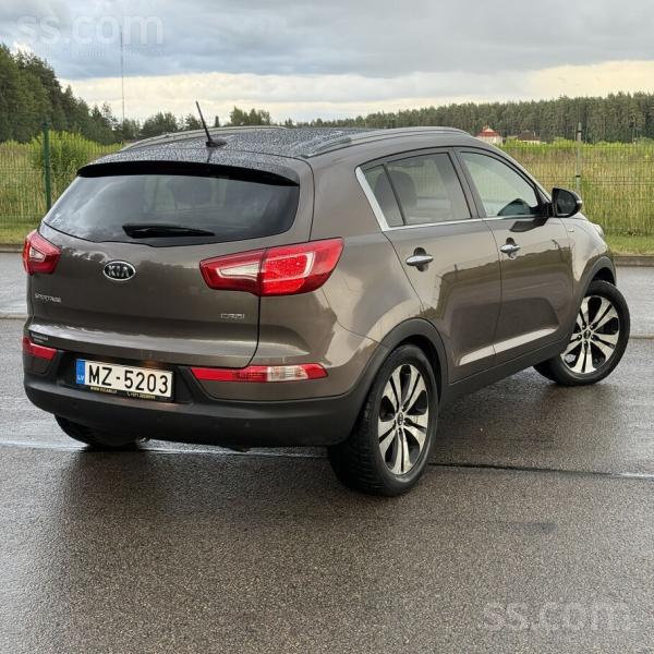 Коричневый Киа Sportage 2011 в Рига, объемом двигателя 2.00 л и пробегом 184 тыс. км за 7500 €, фото 8 на AUTOMOTO.COM.LV