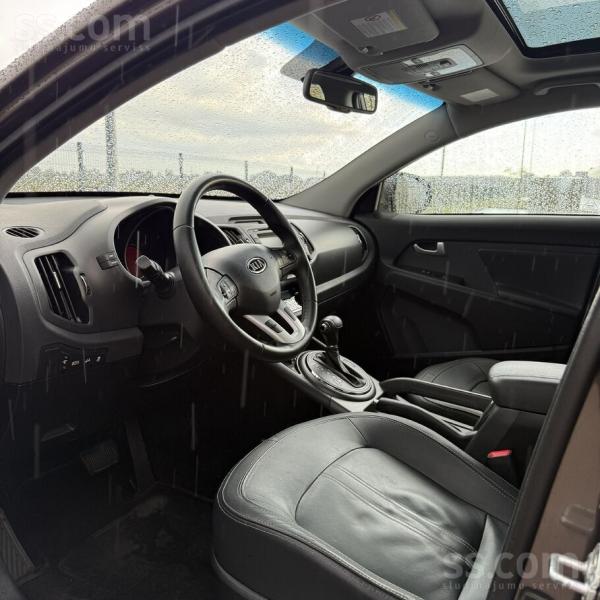 Коричневый Киа Sportage 2011 в Рига, объемом двигателя 2.00 л и пробегом 184 тыс. км за 7500 €, фото 10 на AUTOMOTO.COM.LV