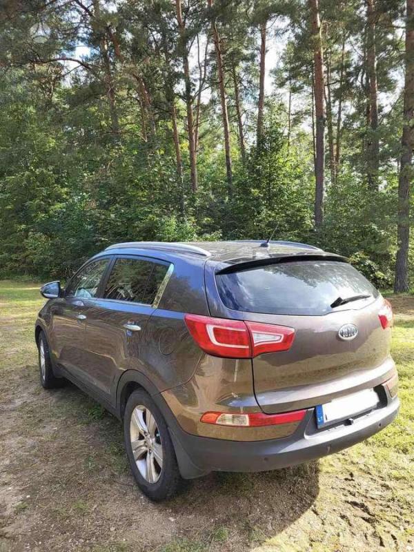 Brown Kia Sportage 2011 in Vilnius, with an engine capacity of 1.69 L and mileage of 245 thousand km for 6200 €, photo 6 on AUTOMOTO.COM.LV