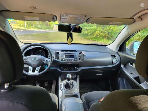 Brown Kia Sportage 2011 in Vilnius, with an engine capacity of 1.69 L and mileage of 245 thousand km for 6200 €, photo 9 on AUTOMOTO.COM.LV
