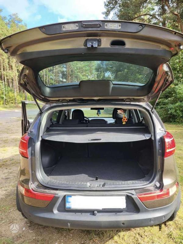 Brown Kia Sportage 2011 in Vilnius, with an engine capacity of 1.69 L and mileage of 245 thousand km for 6200 €, photo 10 on AUTOMOTO.COM.LV
