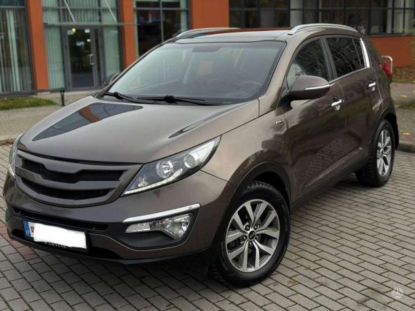 Brown Kia Sportage 2012 in Klaipeda, with an engine capacity of 2.00 L and mileage of 168 thousand km for 7950 €, photo 1 on AUTOMOTO.COM.LV
