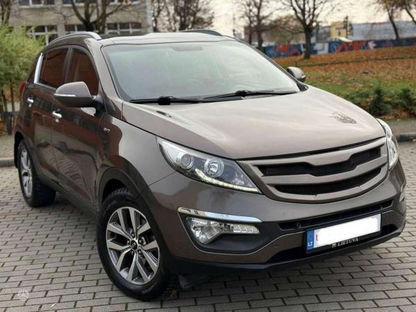 Brown Kia Sportage 2012 in Klaipeda, with an engine capacity of 2.00 L and mileage of 168 thousand km for 7950 €, photo 4 on AUTOMOTO.COM.LV