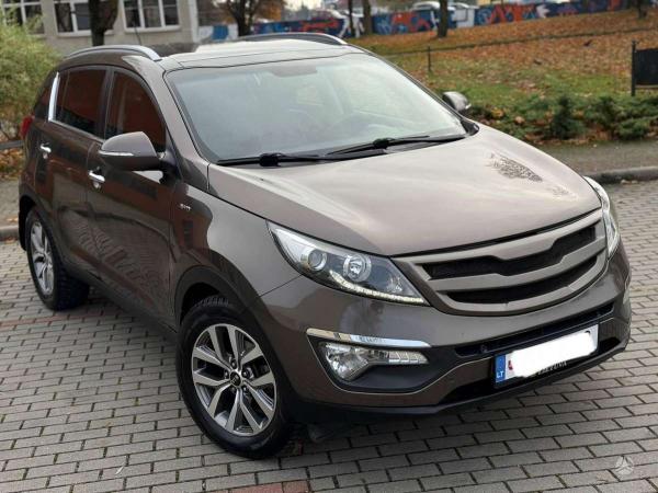 Brown Kia Sportage 2012 in Klaipeda, with an engine capacity of 2.00 L and mileage of 168 thousand km for 7950 €, photo 3 on AUTOMOTO.COM.LV