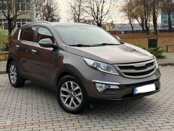 Brown Kia Sportage 2012 in Klaipeda, with an engine capacity of 2.00 L and mileage of 168 thousand km for 7950 €, photo 6 on AUTOMOTO.COM.LV