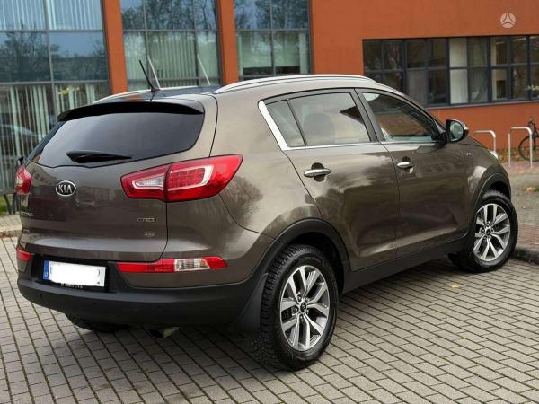 Brown Kia Sportage 2012 in Klaipeda, with an engine capacity of 2.00 L and mileage of 168 thousand km for 7950 €, photo 8 on AUTOMOTO.COM.LV