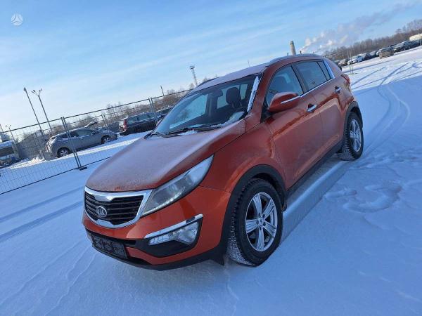 Brūns Kia Sportage 2012 Marijampole, ar dzinēja tilpumu 1.69 L un nobraukumu 189 tūkst. km par 5399 €, foto 2 vietnē AUTOMOTO.COM.LV
