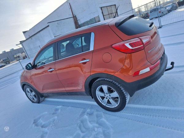 Brūns Kia Sportage 2012 Marijampole, ar dzinēja tilpumu 1.69 L un nobraukumu 189 tūkst. km par 5399 €, foto 3 vietnē AUTOMOTO.COM.LV