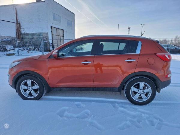 Brūns Kia Sportage 2012 Marijampole, ar dzinēja tilpumu 1.69 L un nobraukumu 189 tūkst. km par 5399 €, foto 4 vietnē AUTOMOTO.COM.LV