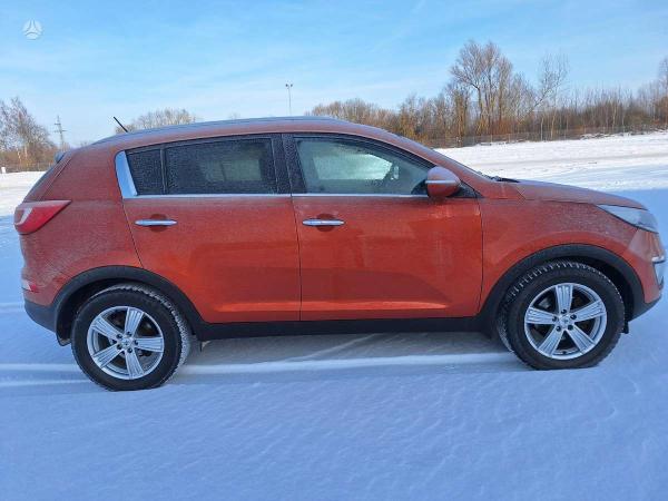 Brūns Kia Sportage 2012 Marijampole, ar dzinēja tilpumu 1.69 L un nobraukumu 189 tūkst. km par 5399 €, foto 5 vietnē AUTOMOTO.COM.LV
