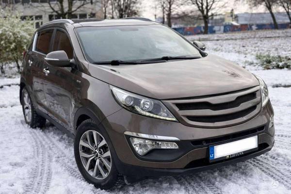 Brown Kia Sportage 2012 in Klaipeda, with an engine capacity of 2.00 L and mileage of 168 thousand km for 7950 €, photo 1 on AUTOMOTO.COM.LV