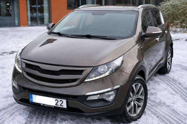 Brown Kia Sportage 2012 in Klaipeda, with an engine capacity of 2.00 L and mileage of 168 thousand km for 7950 €, photo 3 on AUTOMOTO.COM.LV