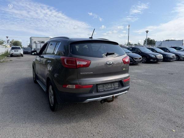 Brūns Kia Sportage 2012 Marijampole, ar dzinēja tilpumu 1.59 L un nobraukumu 209 tūkst. km par 4750 €, foto 4 vietnē AUTOMOTO.COM.LV