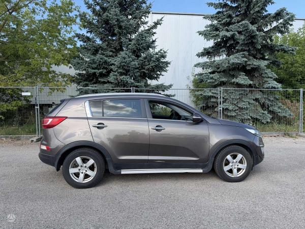 Brūns Kia Sportage 2012 Marijampole, ar dzinēja tilpumu 1.59 L un nobraukumu 209 tūkst. km par 4750 €, foto 5 vietnē AUTOMOTO.COM.LV
