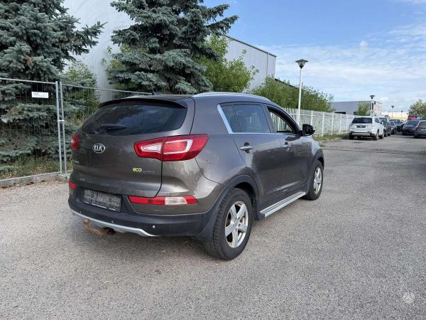 Brūns Kia Sportage 2012 Marijampole, ar dzinēja tilpumu 1.59 L un nobraukumu 209 tūkst. km par 4750 €, foto 6 vietnē AUTOMOTO.COM.LV