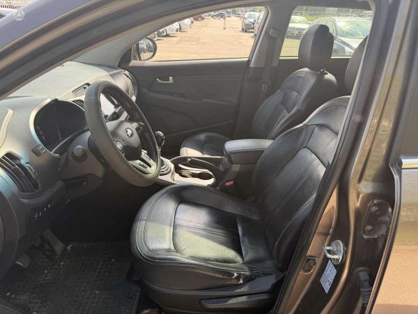 Brūns Kia Sportage 2012 Marijampole, ar dzinēja tilpumu 1.59 L un nobraukumu 209 tūkst. km par 4750 €, foto 9 vietnē AUTOMOTO.COM.LV