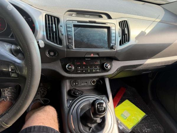 Brūns Kia Sportage 2012 Marijampole, ar dzinēja tilpumu 1.59 L un nobraukumu 209 tūkst. km par 4750 €, foto 10 vietnē AUTOMOTO.COM.LV