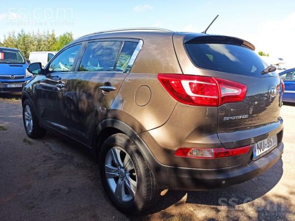 Коричневый Киа Sportage 2012 в Даугавпилс, объемом двигателя 1.70 л и пробегом 0 тыс. км за 7100 €, фото 4 на AUTOMOTO.COM.LV