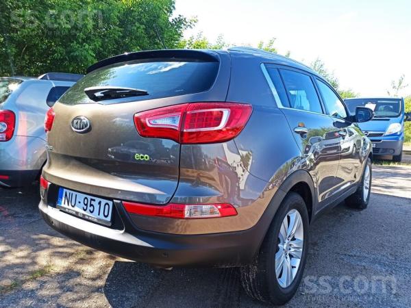Коричневый Киа Sportage 2012 в Даугавпилс, объемом двигателя 1.70 л и пробегом 0 тыс. км за 7100 €, фото 6 на AUTOMOTO.COM.LV