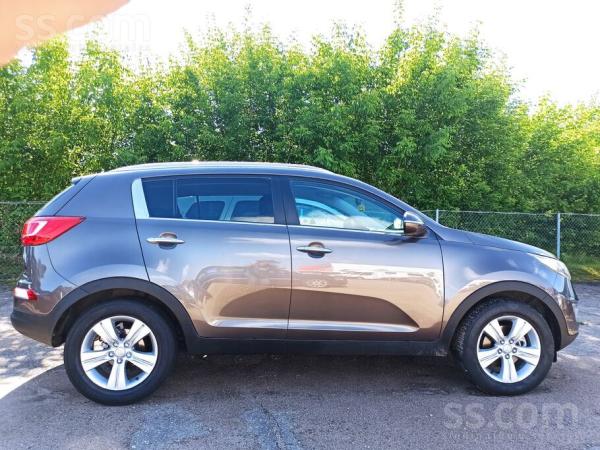 Коричневый Киа Sportage 2012 в Даугавпилс, объемом двигателя 1.70 л и пробегом 0 тыс. км за 7100 €, фото 7 на AUTOMOTO.COM.LV