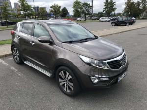Brūns Kia Sportage 2012 Viļņa, ar dzinēja tilpumu 2.00 L un nobraukumu 190 tūkst. km par 8300 €, foto  vietnē AUTOMOTO.COM.LV