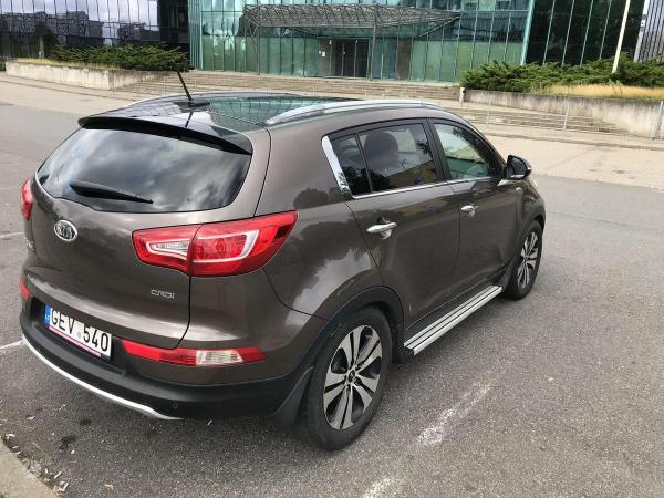 Brown Kia Sportage 2012 in Vilnius, with an engine capacity of 2.00 L and mileage of 190 thousand km for 8300 €, photo 4 on AUTOMOTO.COM.LV