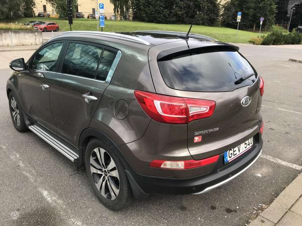 Brown Kia Sportage 2012 in Vilnius, with an engine capacity of 2.00 L and mileage of 190 thousand km for 8300 €, photo 6 on AUTOMOTO.COM.LV
