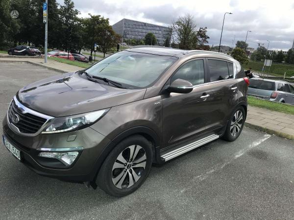 Brown Kia Sportage 2012 in Vilnius, with an engine capacity of 2.00 L and mileage of 190 thousand km for 8300 €, photo 8 on AUTOMOTO.COM.LV