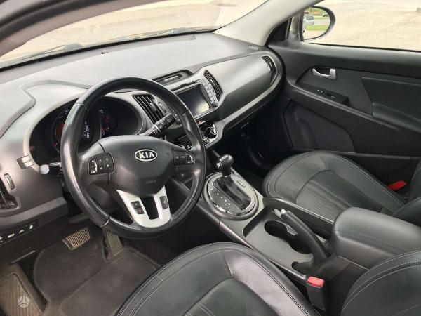 Brown Kia Sportage 2012 in Vilnius, with an engine capacity of 2.00 L and mileage of 190 thousand km for 8300 €, photo 9 on AUTOMOTO.COM.LV