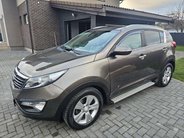 Brūns Kia Sportage 2013 Palanga, ar dzinēja tilpumu 1.69 L un nobraukumu 251 tūkst. km par 5300 €, foto 1 vietnē AUTOMOTO.COM.LV