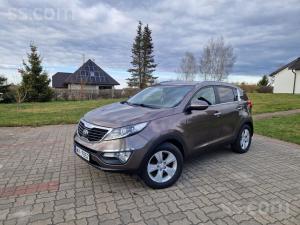 Brown Kia Sportage 2013 in Riga, with an engine capacity of 1.70 L and mileage of 195 thousand km for 6500 €, photo  on AUTOMOTO.COM.LV