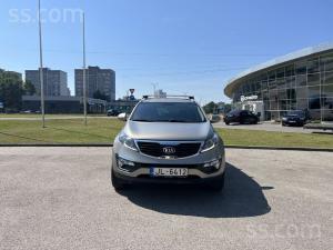 Brown Kia Sportage 2013 in Riga, with an engine capacity of 1.70 L and mileage of 162 thousand km for 5900 €, photo  on AUTOMOTO.COM.LV