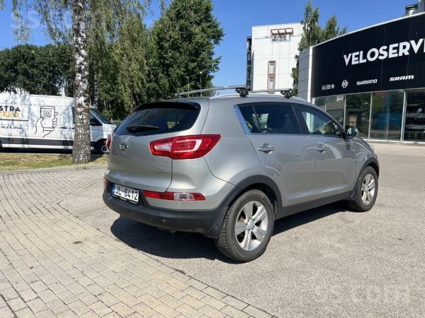 Brown Kia Sportage 2013 in Riga, with an engine capacity of 1.70 L and mileage of 162 thousand km for 5900 €, photo 4 on AUTOMOTO.COM.LV