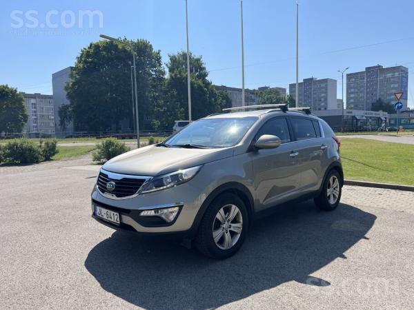 Brown Kia Sportage 2013 in Riga, with an engine capacity of 1.70 L and mileage of 162 thousand km for 5900 €, photo 8 on AUTOMOTO.COM.LV