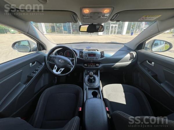 Brown Kia Sportage 2013 in Riga, with an engine capacity of 1.70 L and mileage of 162 thousand km for 5900 €, photo 10 on AUTOMOTO.COM.LV