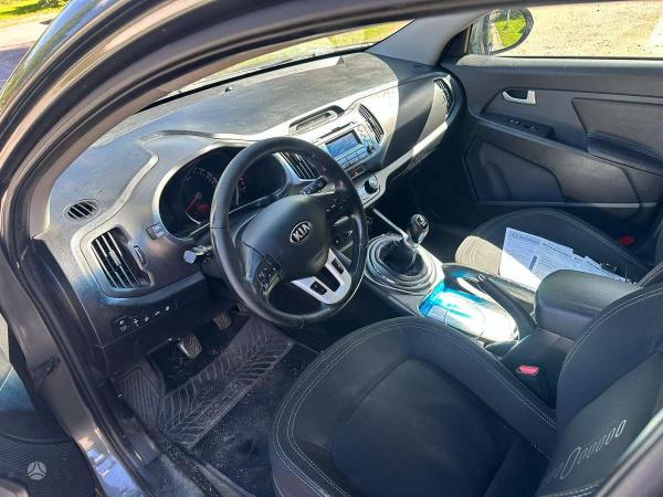 Brūns Kia Sportage 2013 Telšiai, ar dzinēja tilpumu 1.69 L un nobraukumu 300 tūkst. km par 4850 €, foto 5 vietnē AUTOMOTO.COM.LV
