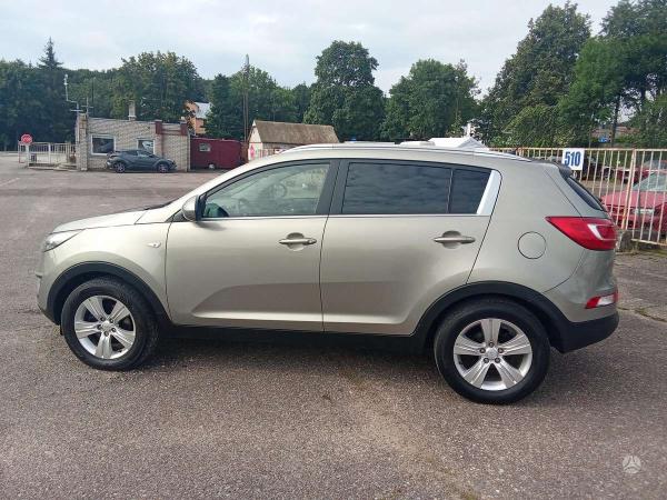 Brūns Kia Sportage 2013 Alīta, ar dzinēja tilpumu 1.69 L un nobraukumu 282 tūkst. km par 6300 €, foto 4 vietnē AUTOMOTO.COM.LV