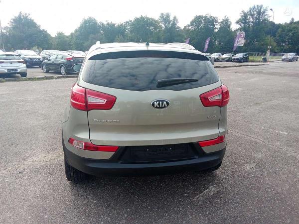 Brūns Kia Sportage 2013 Alīta, ar dzinēja tilpumu 1.69 L un nobraukumu 282 tūkst. km par 6300 €, foto 11 vietnē AUTOMOTO.COM.LV