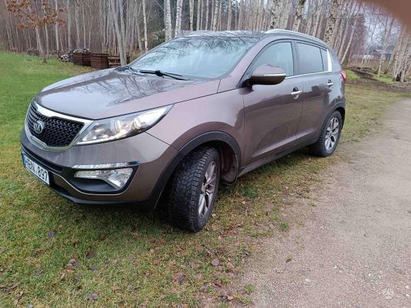 Brown Kia Sportage 2014 in Silute, with an engine capacity of 2.00 L and mileage of 127 thousand km for 8150 €, photo 5 on AUTOMOTO.COM.LV