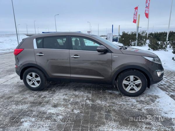 Brown Kia Sportage 2014 in Rakvere, with an engine capacity of 2.00 L and mileage of 288 thousand km for 9500 €, photo 3 on AUTOMOTO.COM.LV