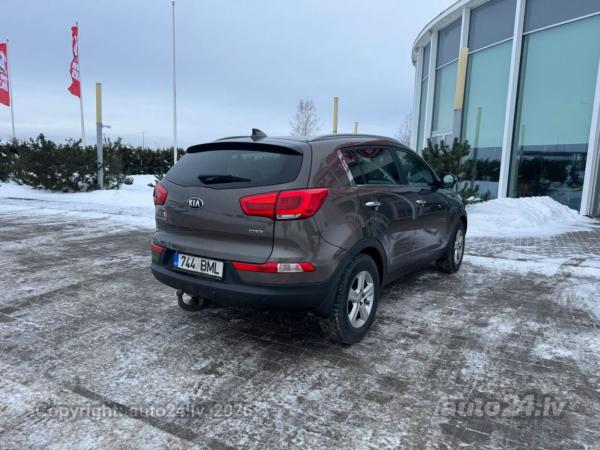 Brown Kia Sportage 2014 in Rakvere, with an engine capacity of 2.00 L and mileage of 288 thousand km for 9500 €, photo 6 on AUTOMOTO.COM.LV