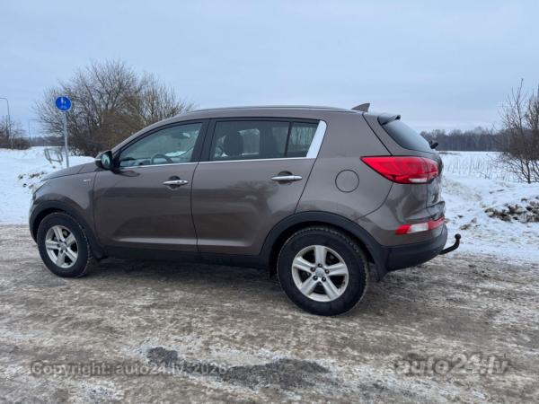 Brown Kia Sportage 2014 in Rakvere, with an engine capacity of 2.00 L and mileage of 288 thousand km for 9500 €, photo 8 on AUTOMOTO.COM.LV
