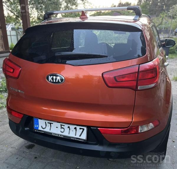 Коричневый Киа Sportage 2014 в Рига, объемом двигателя 2.00 л и пробегом 321 тыс. км за 6290 €, фото 5 на AUTOMOTO.COM.LV