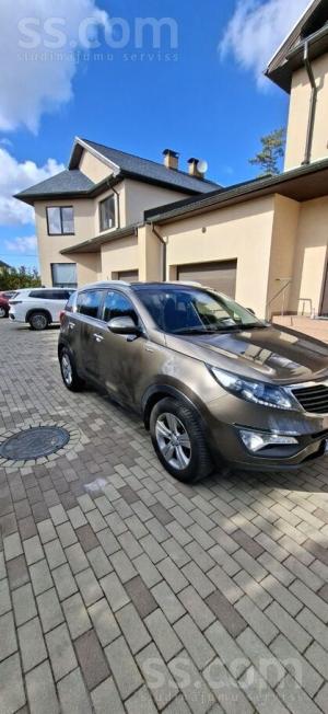 Brūns Kia Sportage 2014 Rīga, ar dzinēja tilpumu 2.00 L un nobraukumu 190 tūkst. km par 9000 €, foto  vietnē AUTOMOTO.COM.LV