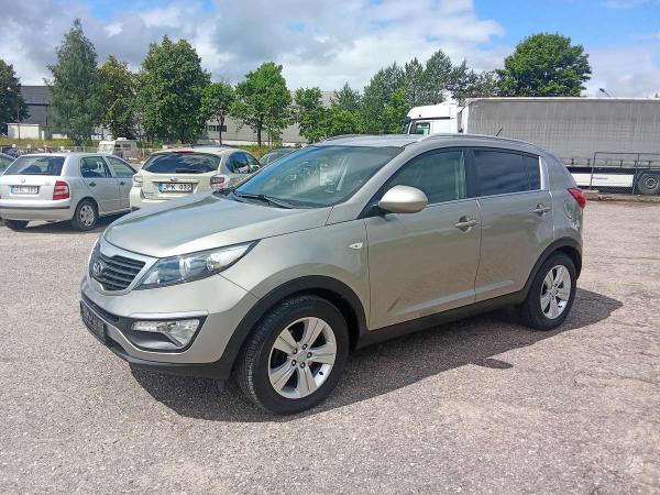 Brown Kia Sportage 2014 in Alytus, with an engine capacity of 1.69 L and mileage of 280 thousand km for 6700 €, photo 5 on AUTOMOTO.COM.LV