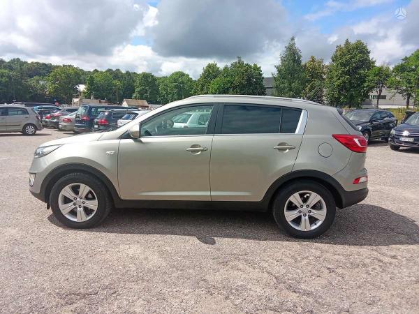 Brown Kia Sportage 2014 in Alytus, with an engine capacity of 1.69 L and mileage of 280 thousand km for 6700 €, photo 7 on AUTOMOTO.COM.LV